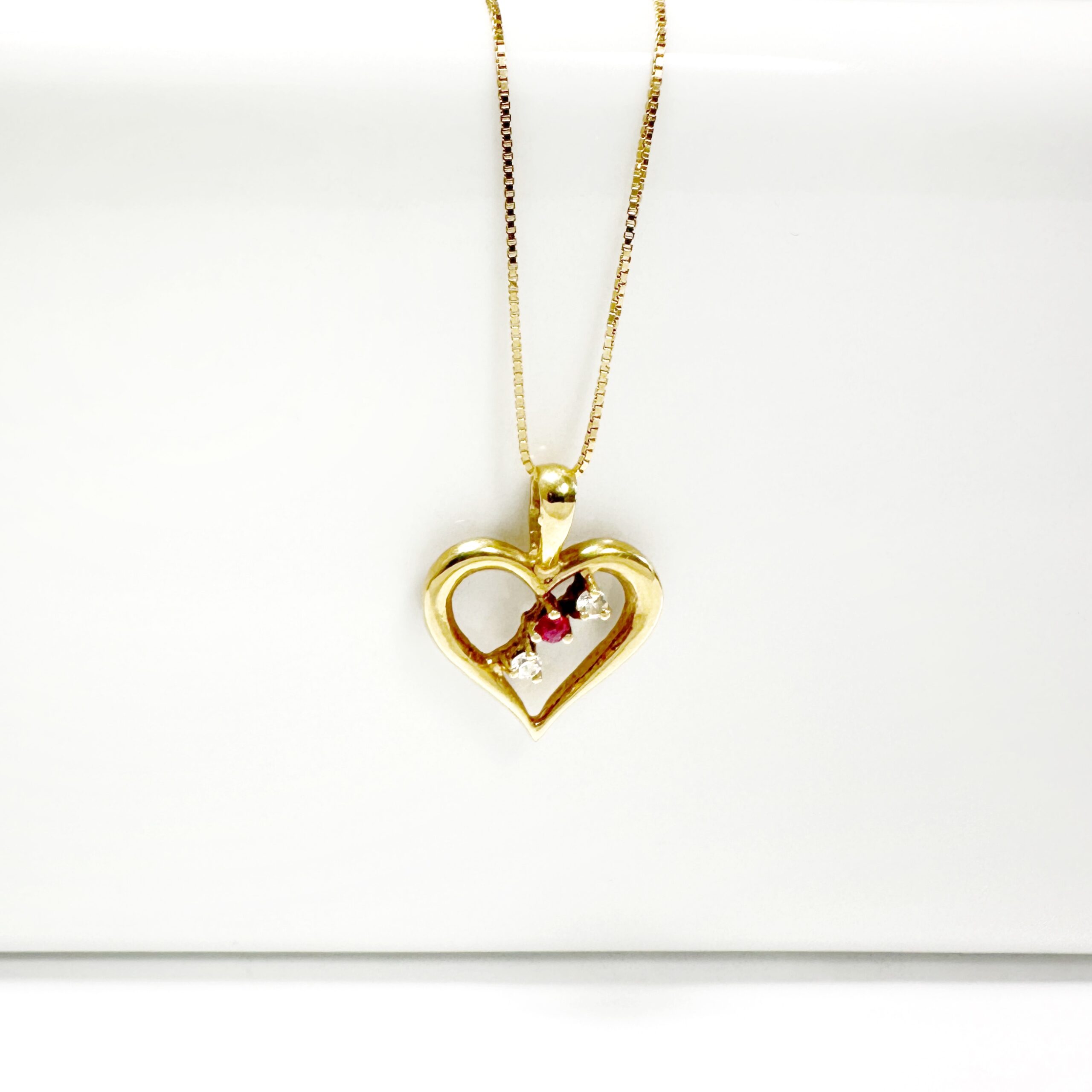 Gold, ruby and white sapphire heart pendant "Aimée" | ÓNÍSÌ PARIS